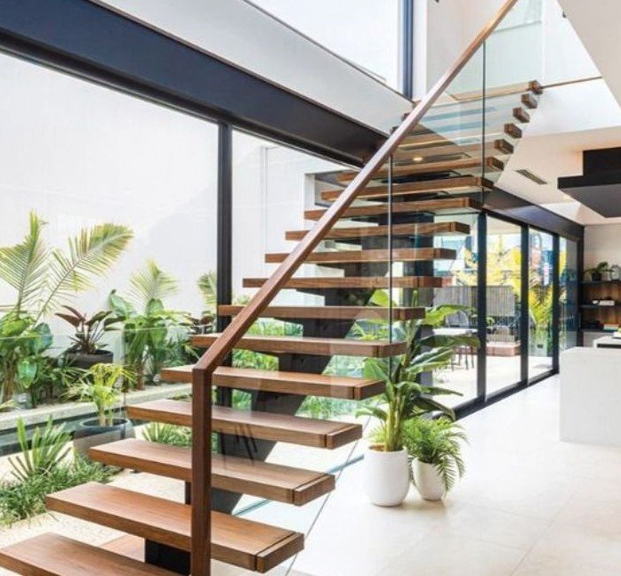 10 Stunning Wooden Glass Railing Designs to Transform Your Interiors ...
